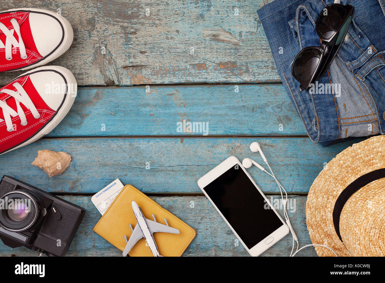 Still life of various items for recreation, clothing, hat, sneakers ...