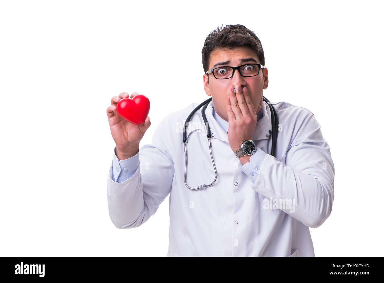Young male cardiologist doctor holding a heart isolated on white ...