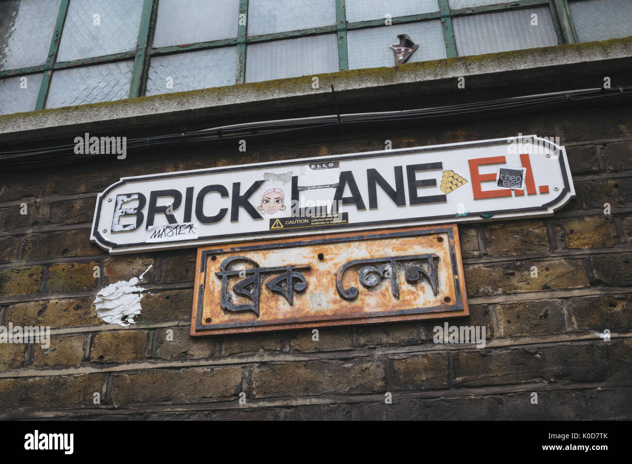 Brick Lane street sign in English and Bengali. The street is the heart ...