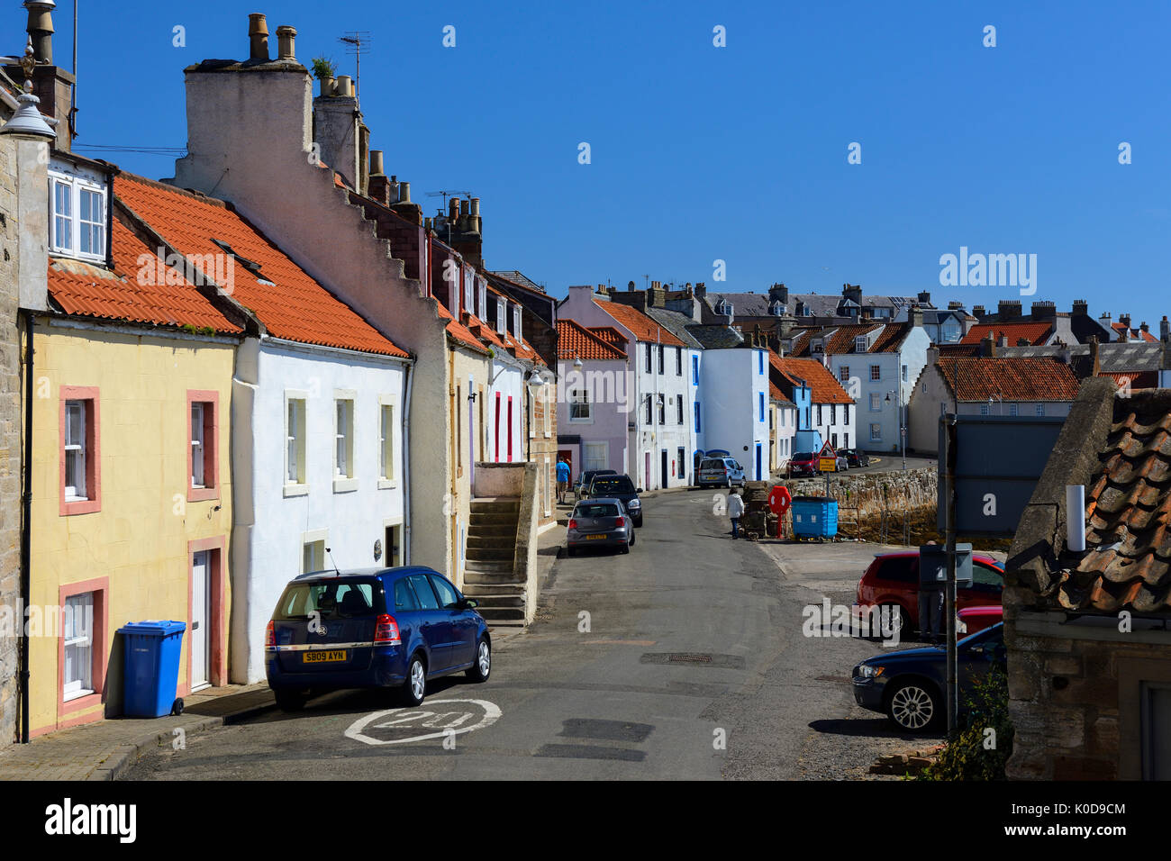 Colourful renovated buildings in waterfront of Scottish coastal town of ...