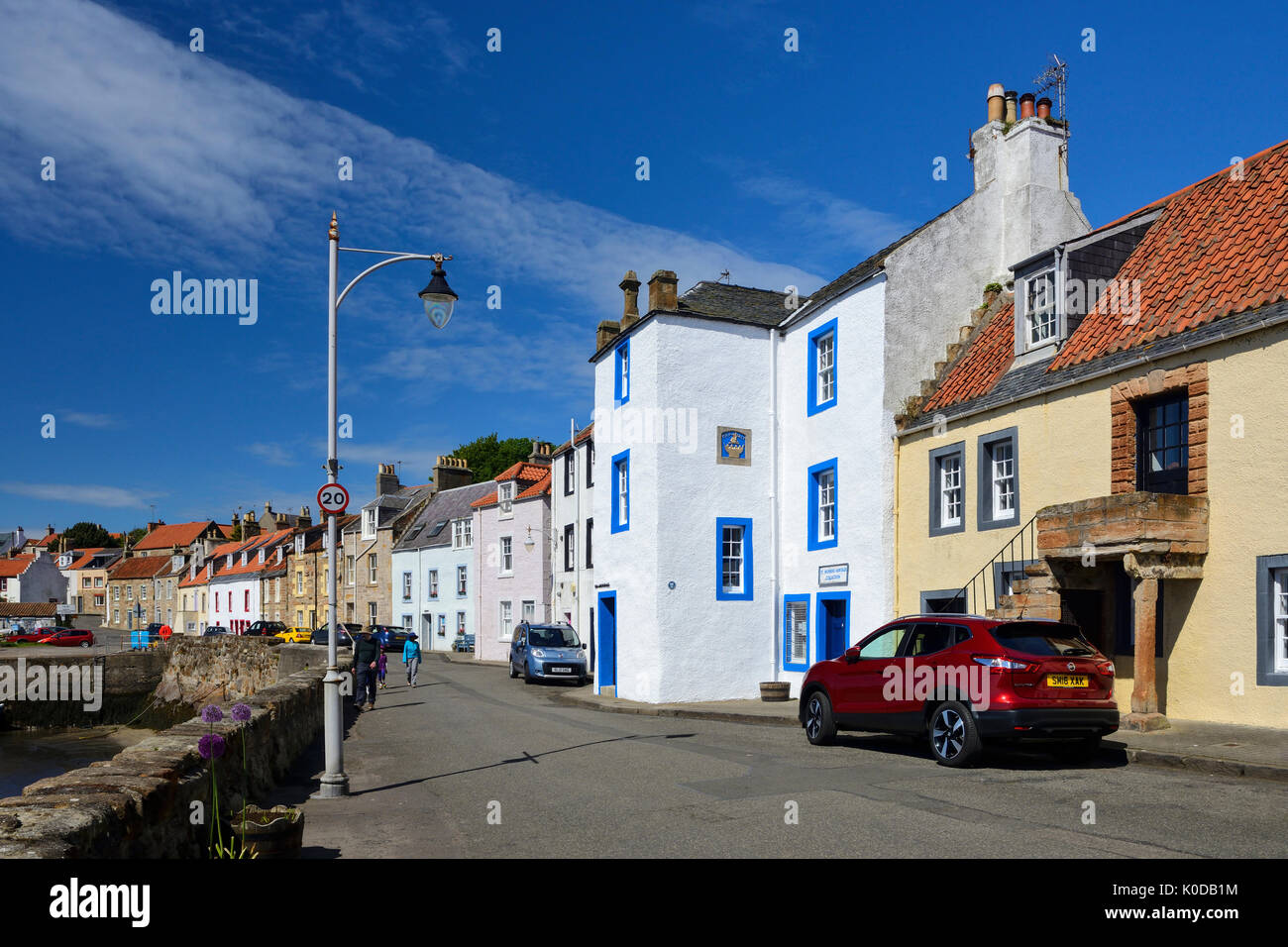 Colourful renovated buildings in waterfront of Scottish coastal town of ...