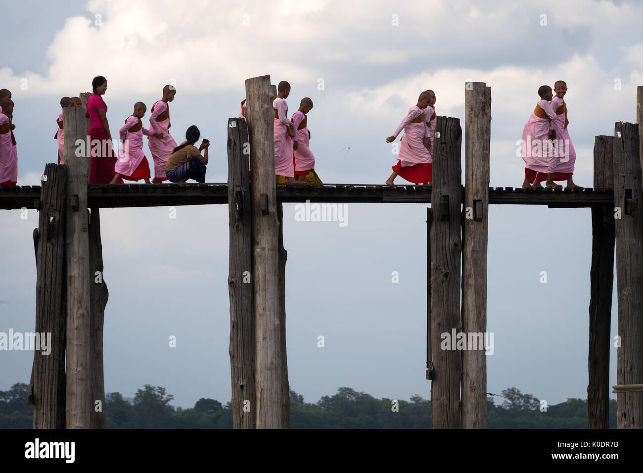 Female monks crossing bridge hi-res stock photography and images - Alamy