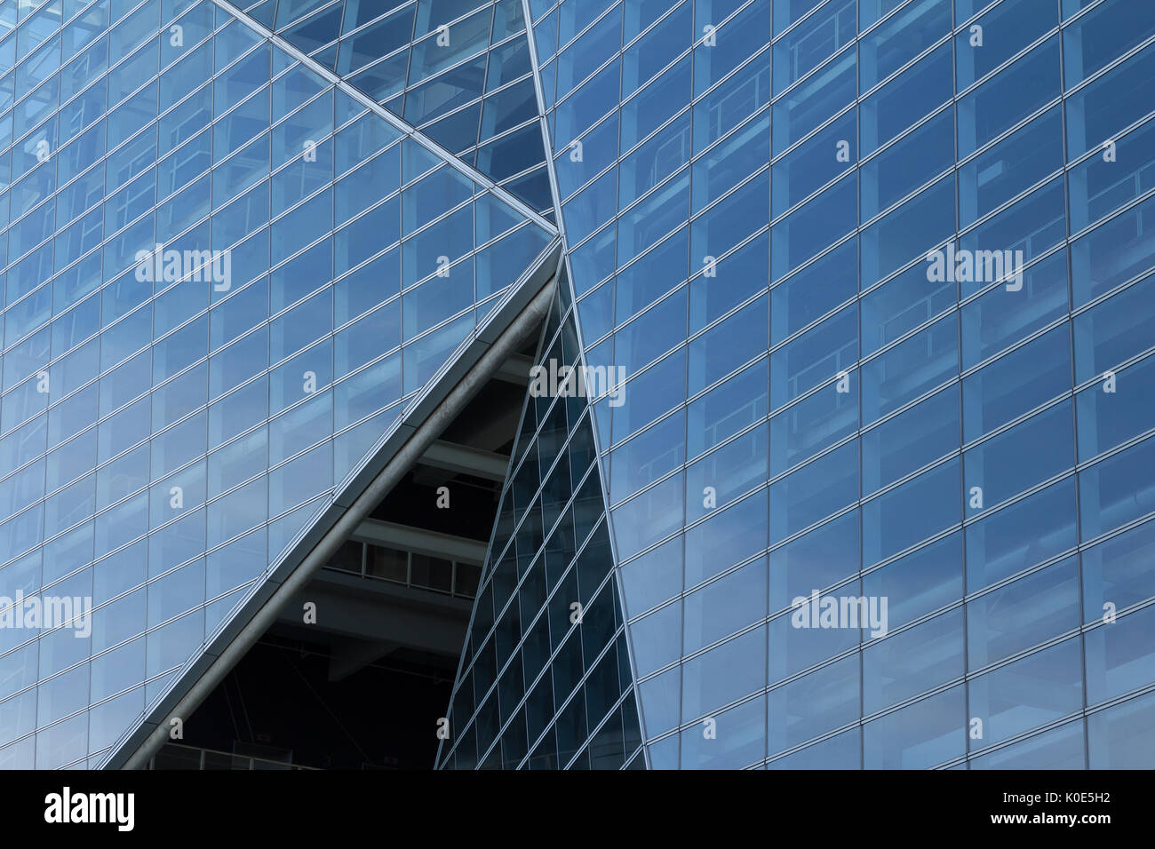 Modern glass wall of office building windows Stock Photo - Alamy