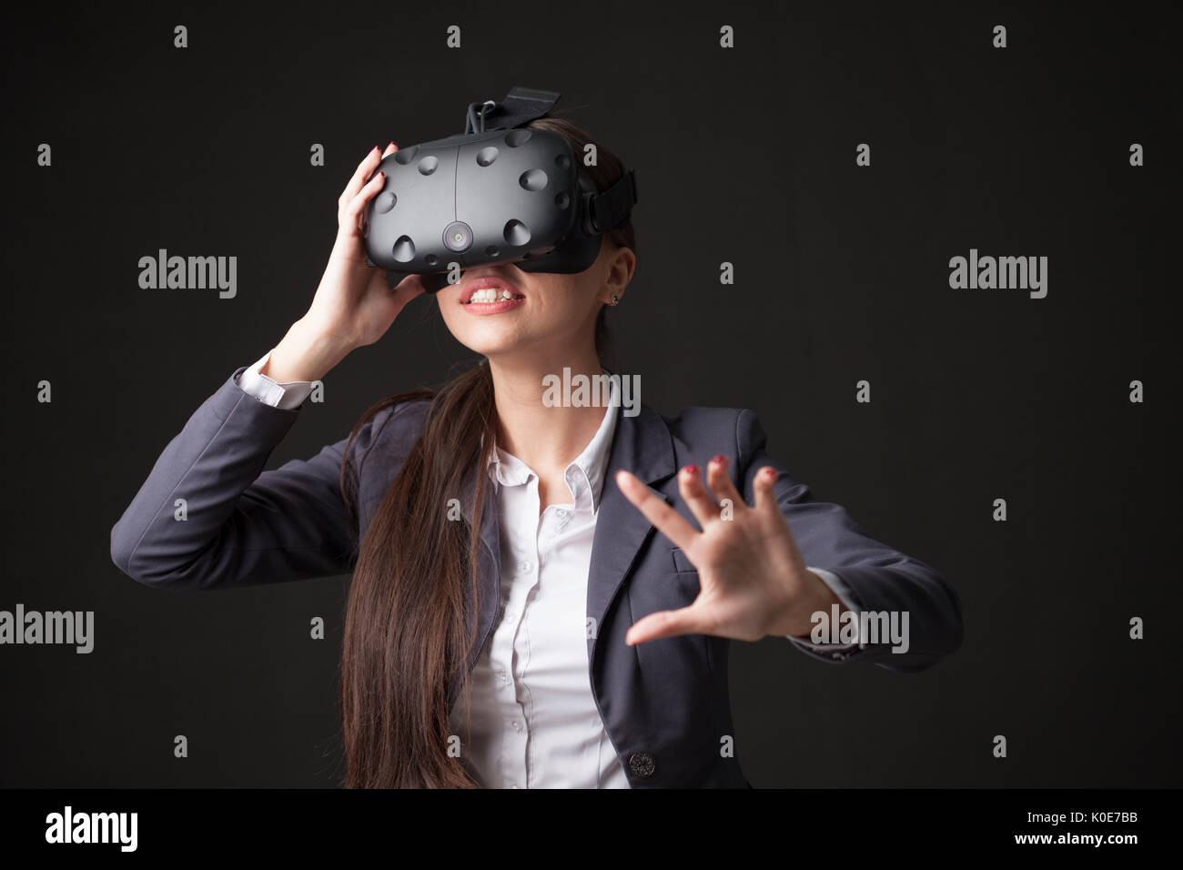 Woman with virtual reality goggles. Studio shot, white background Stock ...