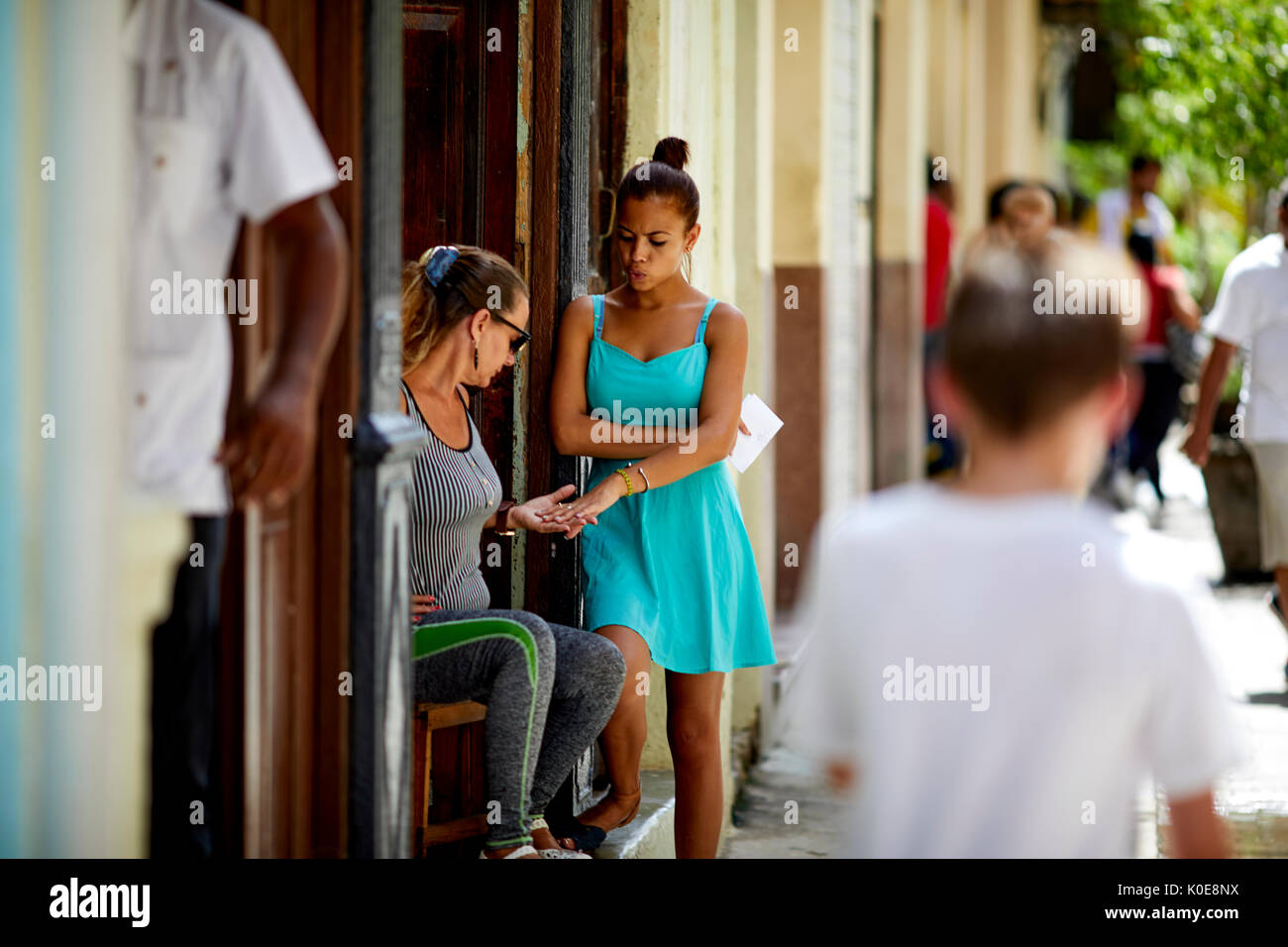 Capital Havana in Cuba, shop workers outside a gift shop in Old Town ...