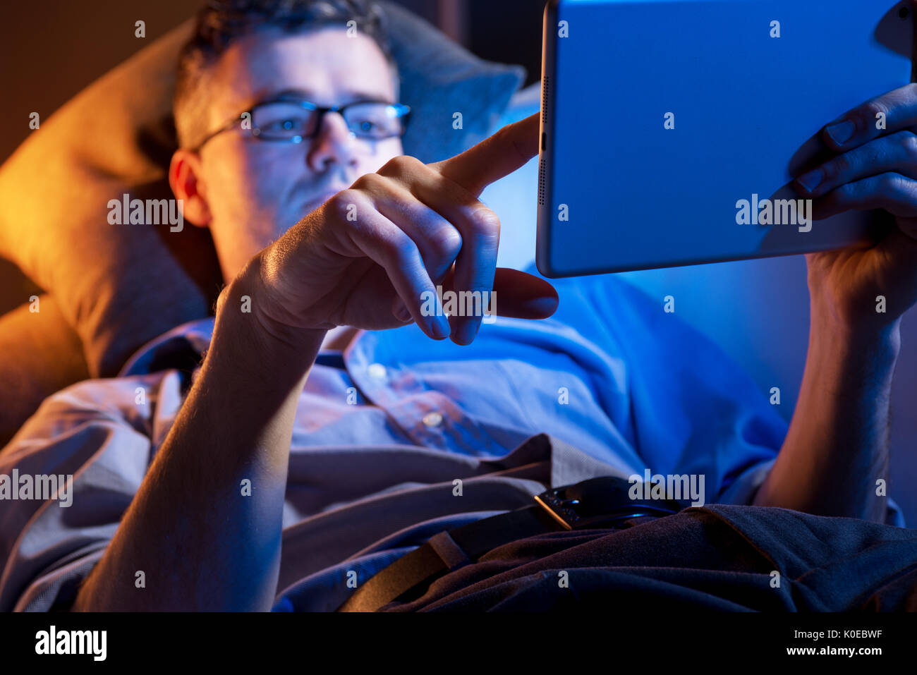 Man working night lying down hi-res stock photography and images - Alamy
