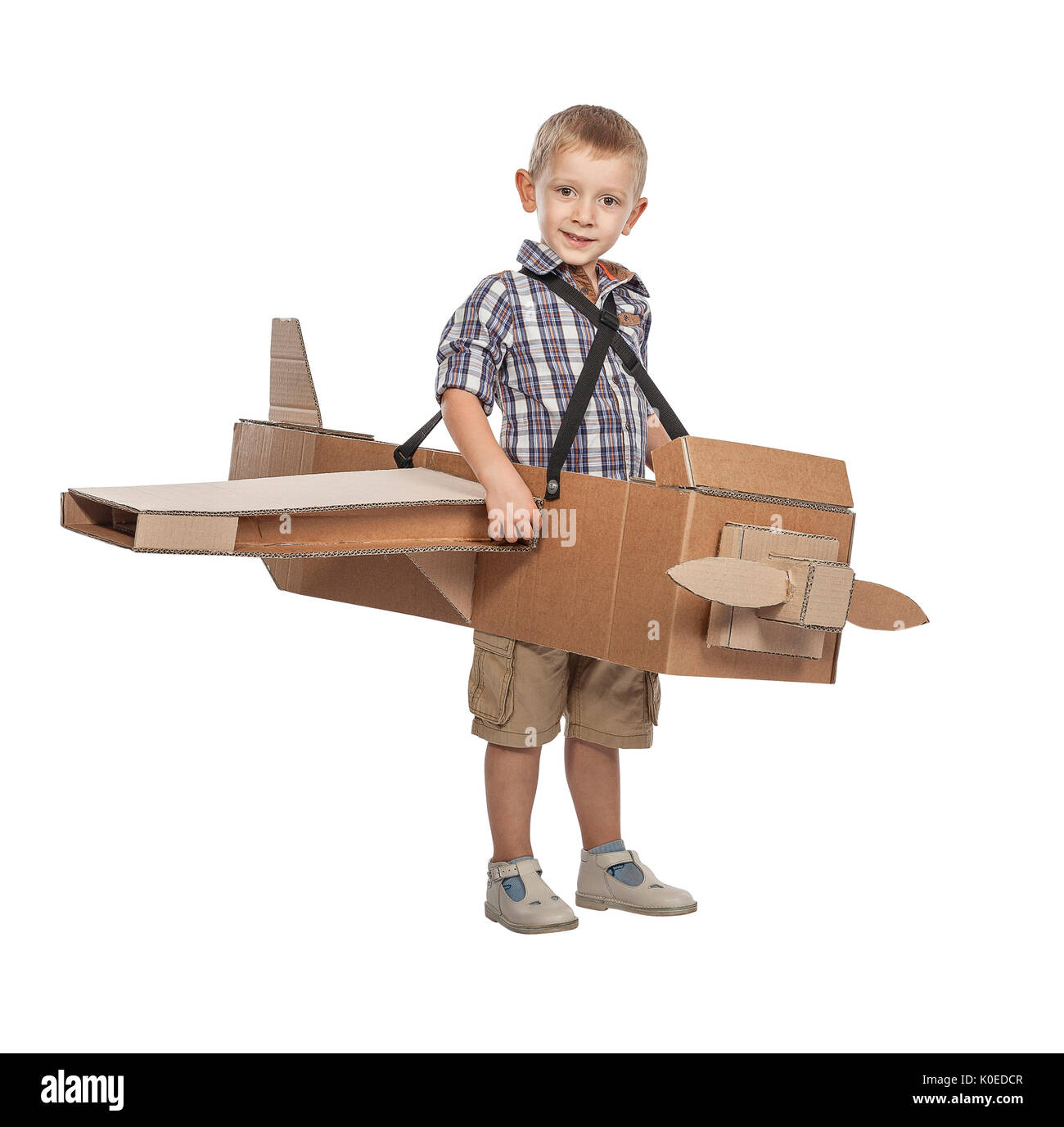 caucasian child play with cardboard airplane isolated on white ...