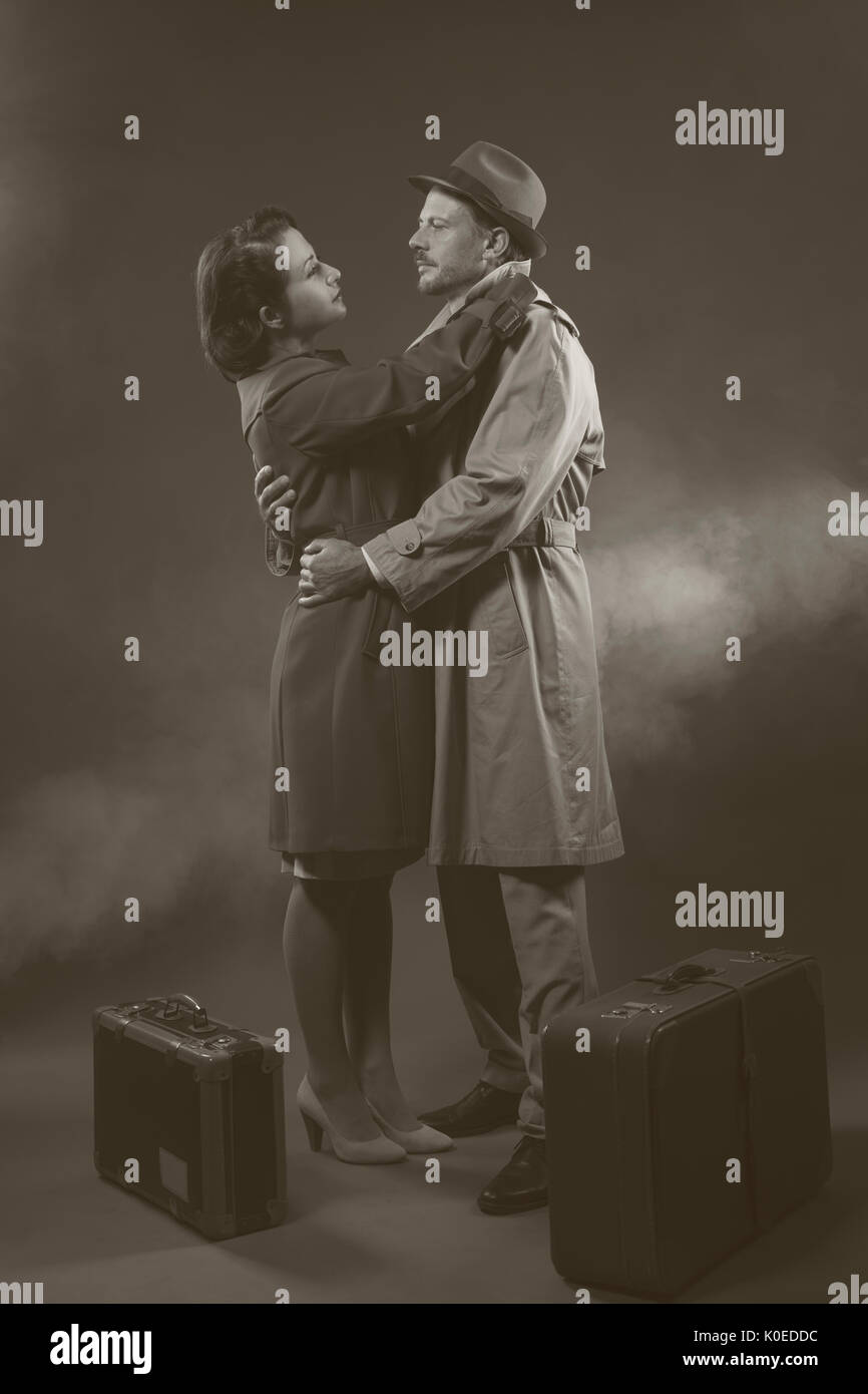 Film noir: romantic loving couple embracing in the dark, 1950s style ...