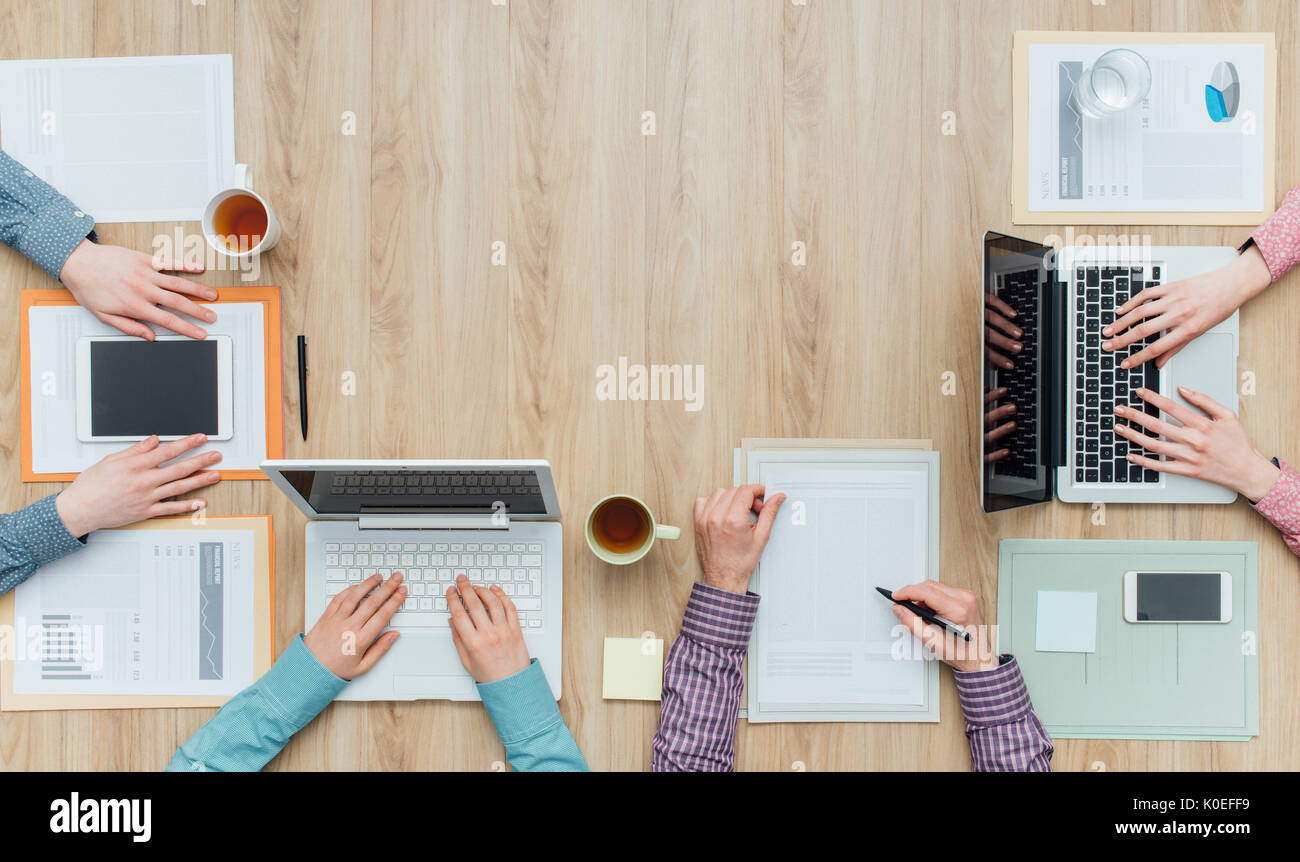 Team meetings are desk hi-res stock photography and images - Alamy