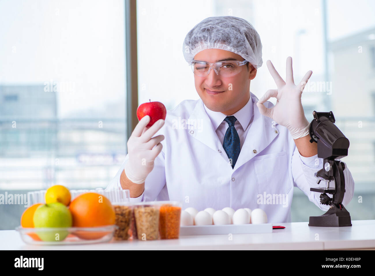 Nutrition expert testing food products in lab Stock Photo - Alamy