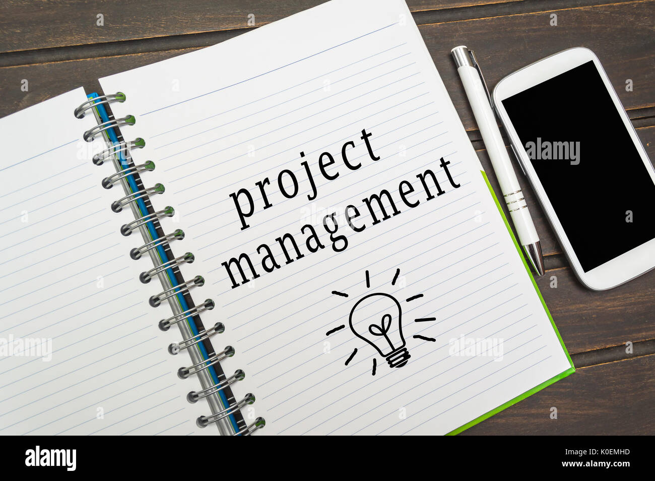 Project management word in notebook for website content concept Stock ...