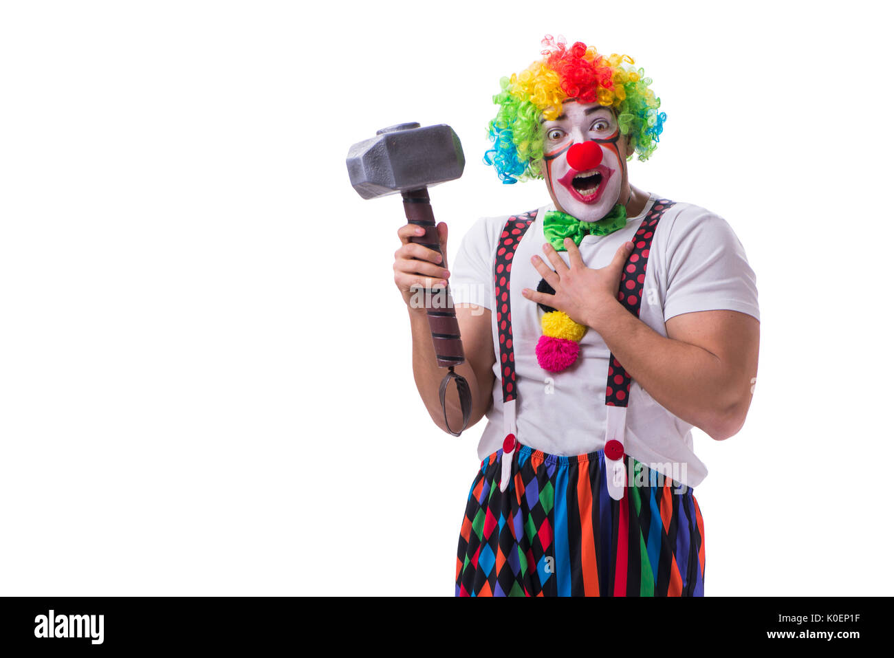 Funny clown with a hammer isolated on white background Stock Photo - Alamy