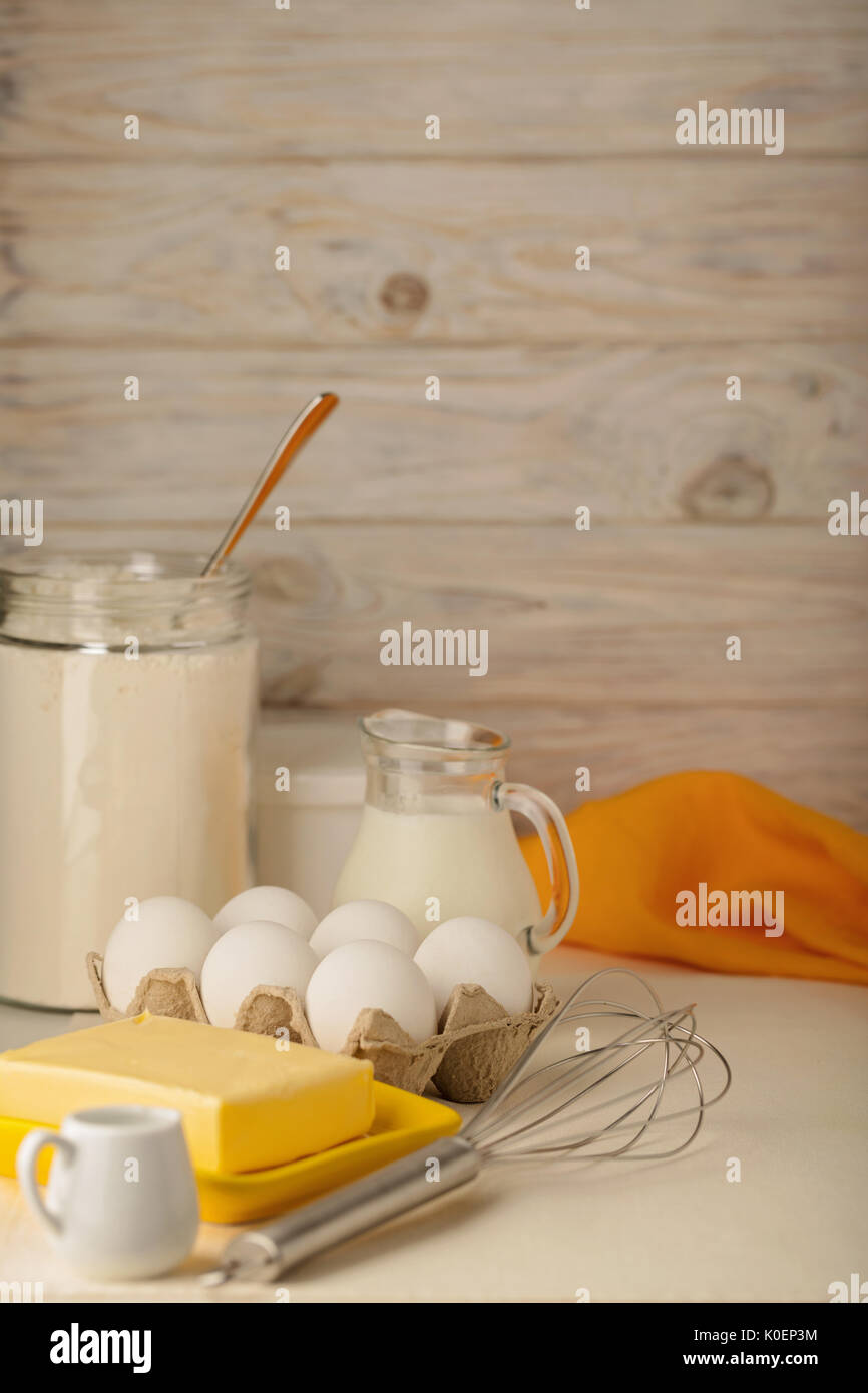 Kitchen utensils, tools and products for homemade cakes on a light ...