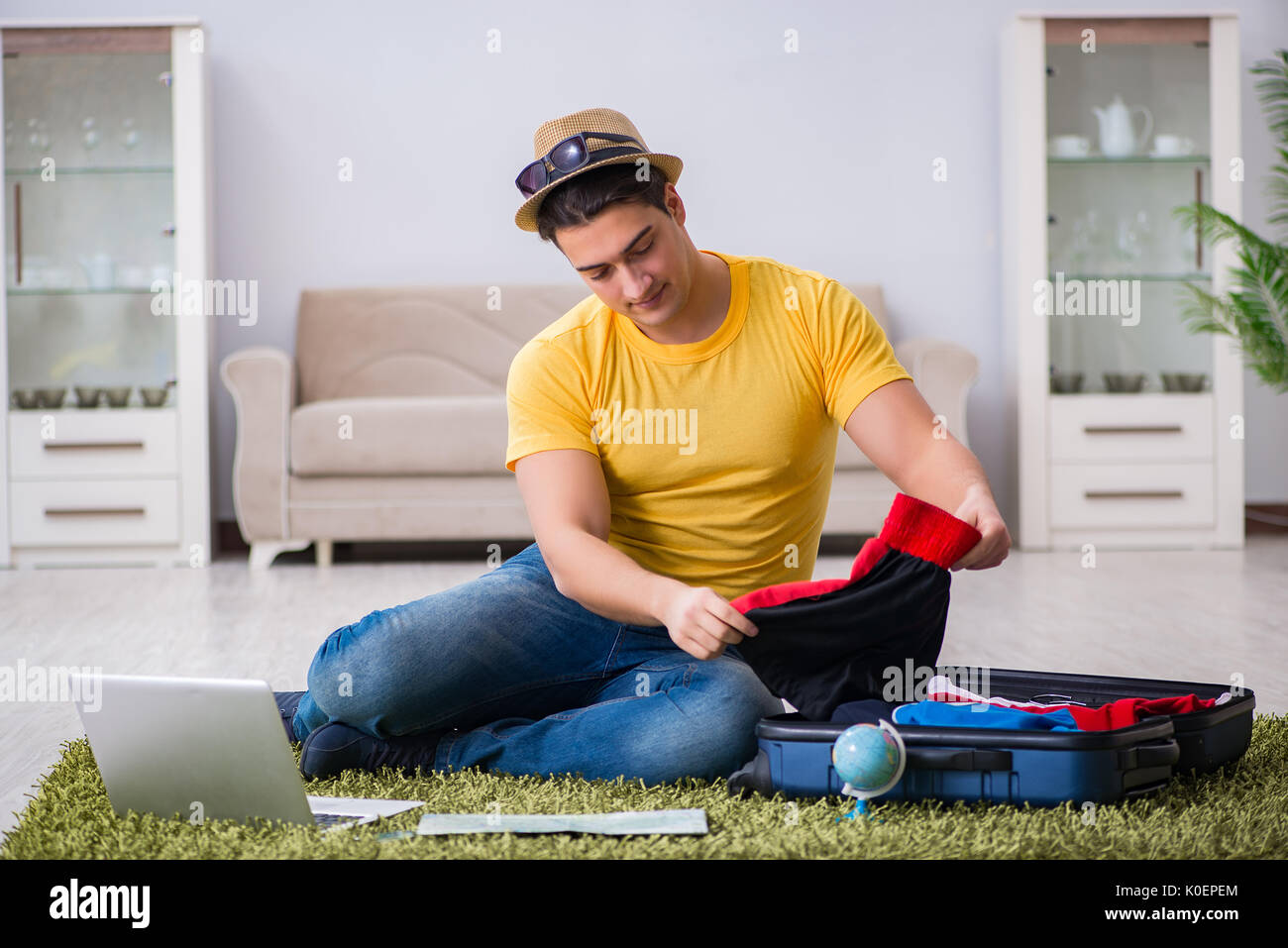 Man planning his vacation trip with map Stock Photo - Alamy
