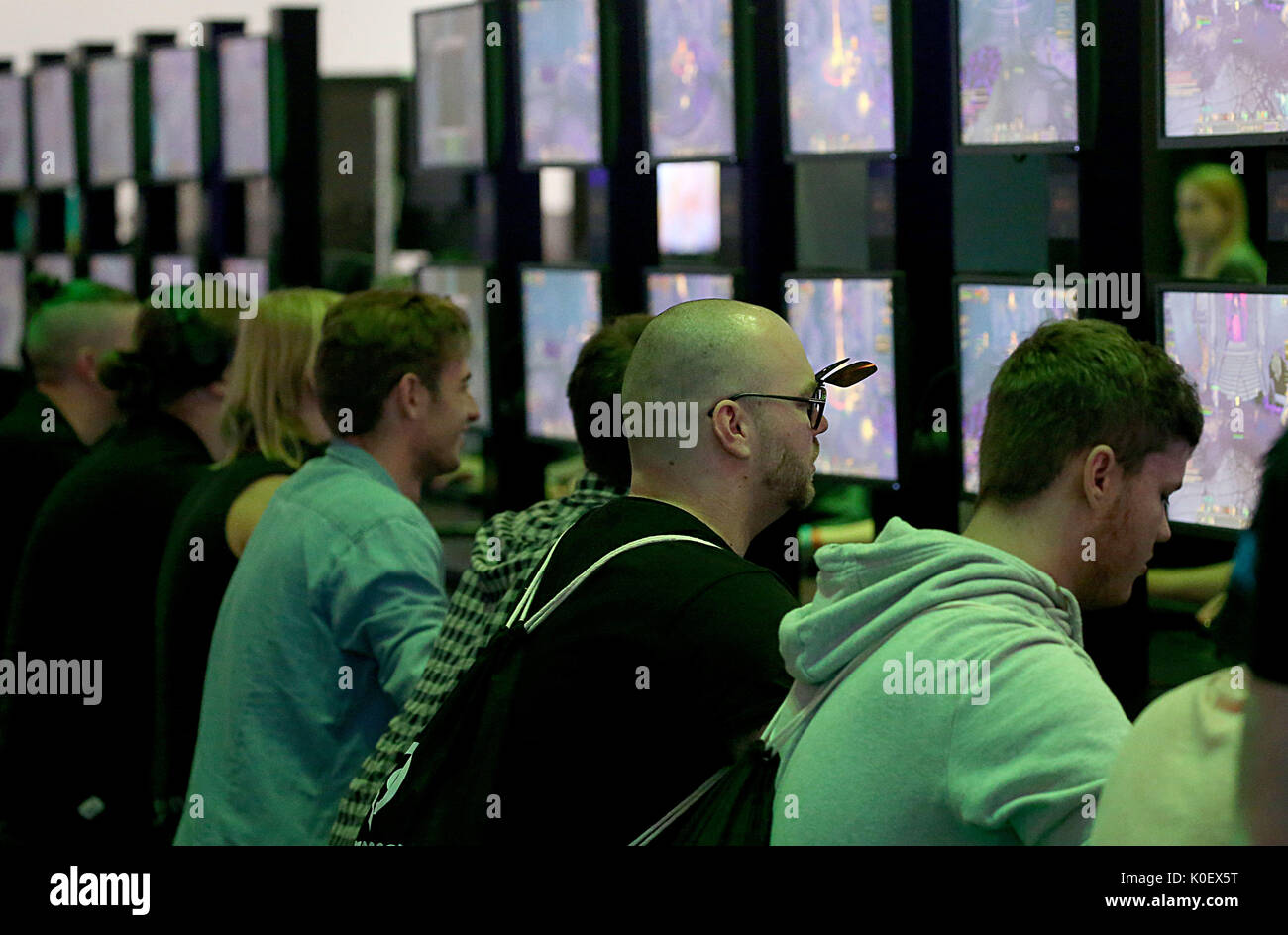 Cologne, Germany. 22nd Aug, 2017. Video gamers test a game at the ...