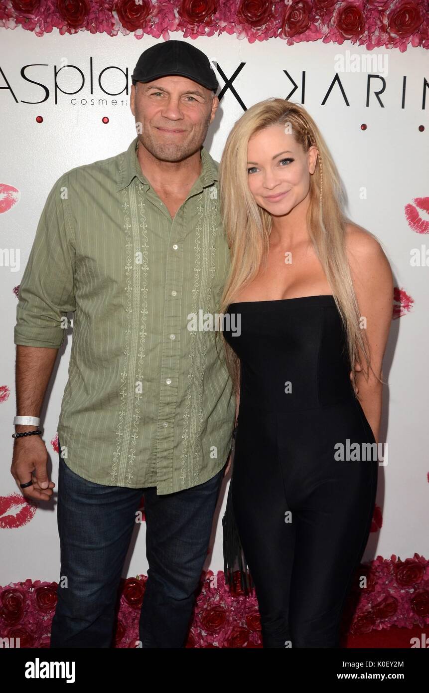 Beverly Hills, CA. 21st Aug, 2017. Randy Couture, Mindy Robinson at ...