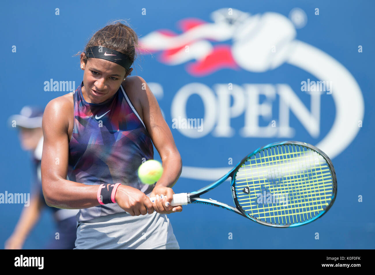 New York, USA. 22nd Aug, 2017. Whitney Osuigwe of USA returns ball ...