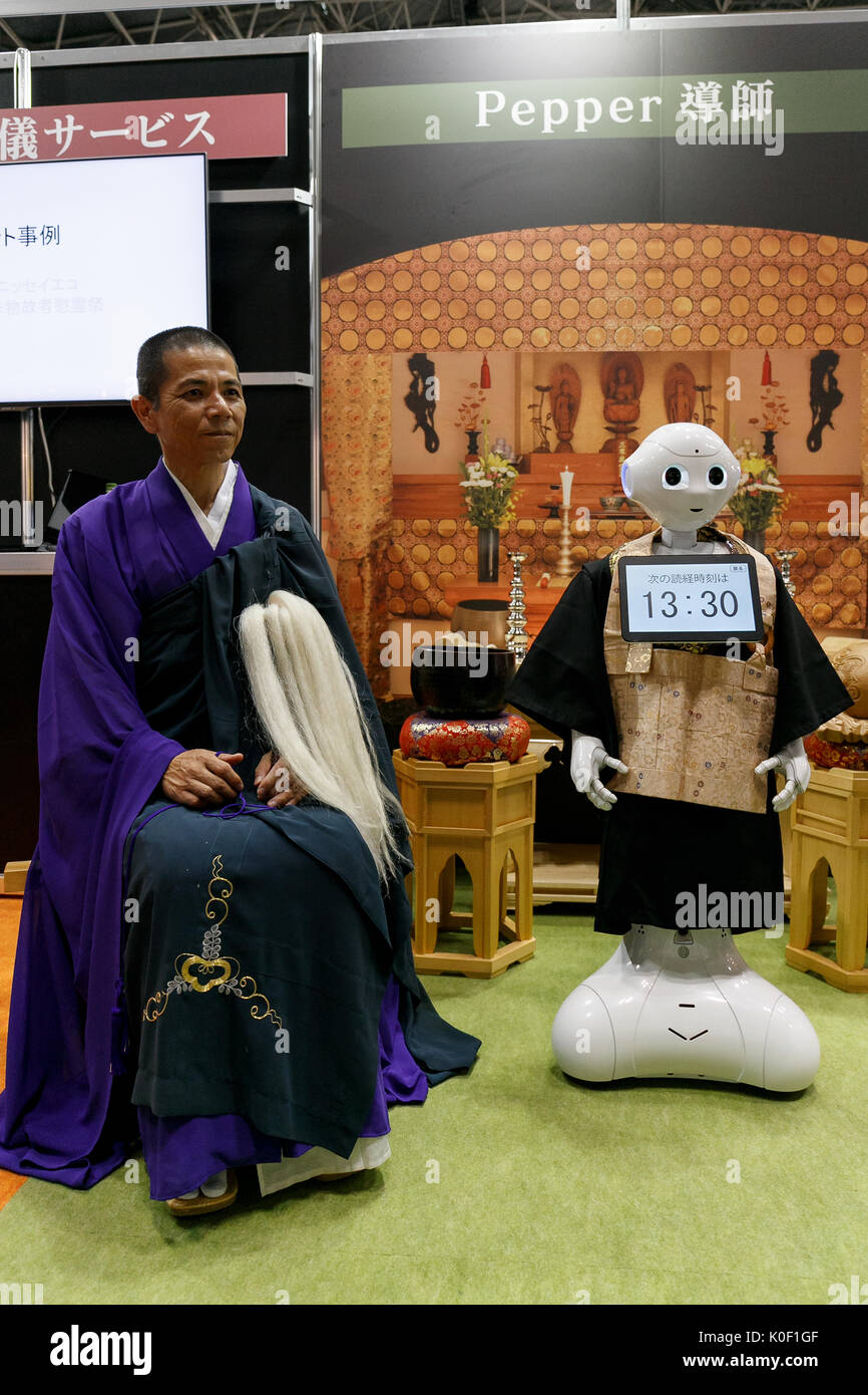 Tokyo, Japan. 23rd Aug, 2017. (L to R) A Buddhist monk and a SoftBank ...