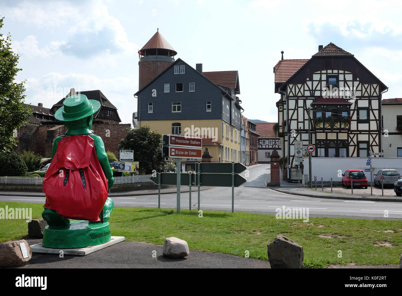The art project "Unity Man" standing at the "Unity Bridge" and looking ...