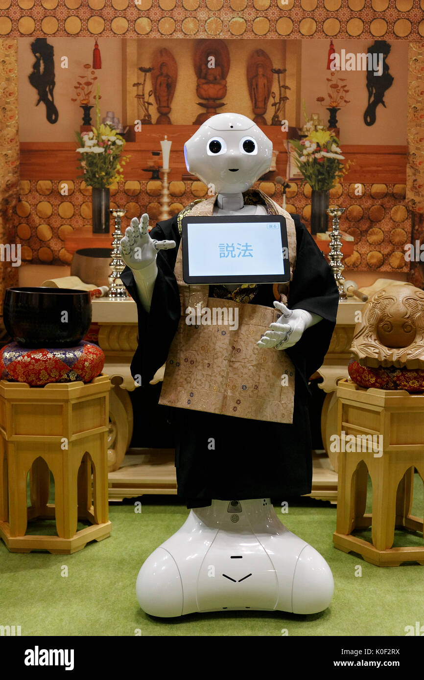 SoftBank humanoid robot Pepper dressed as Buddhist monk performs at ...