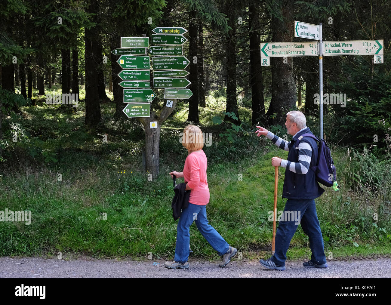 Hikers on signposted walking paths in Neustadt am Rennsteig, Germany ...