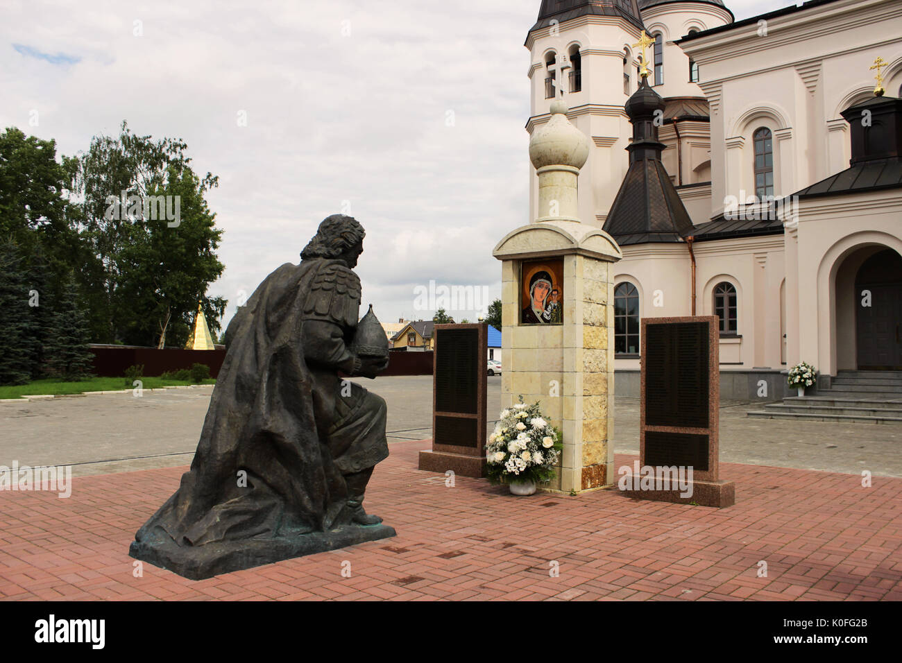 Sculpture kneeling figure of the Holy Prince Alexander Nevsky near the ...
