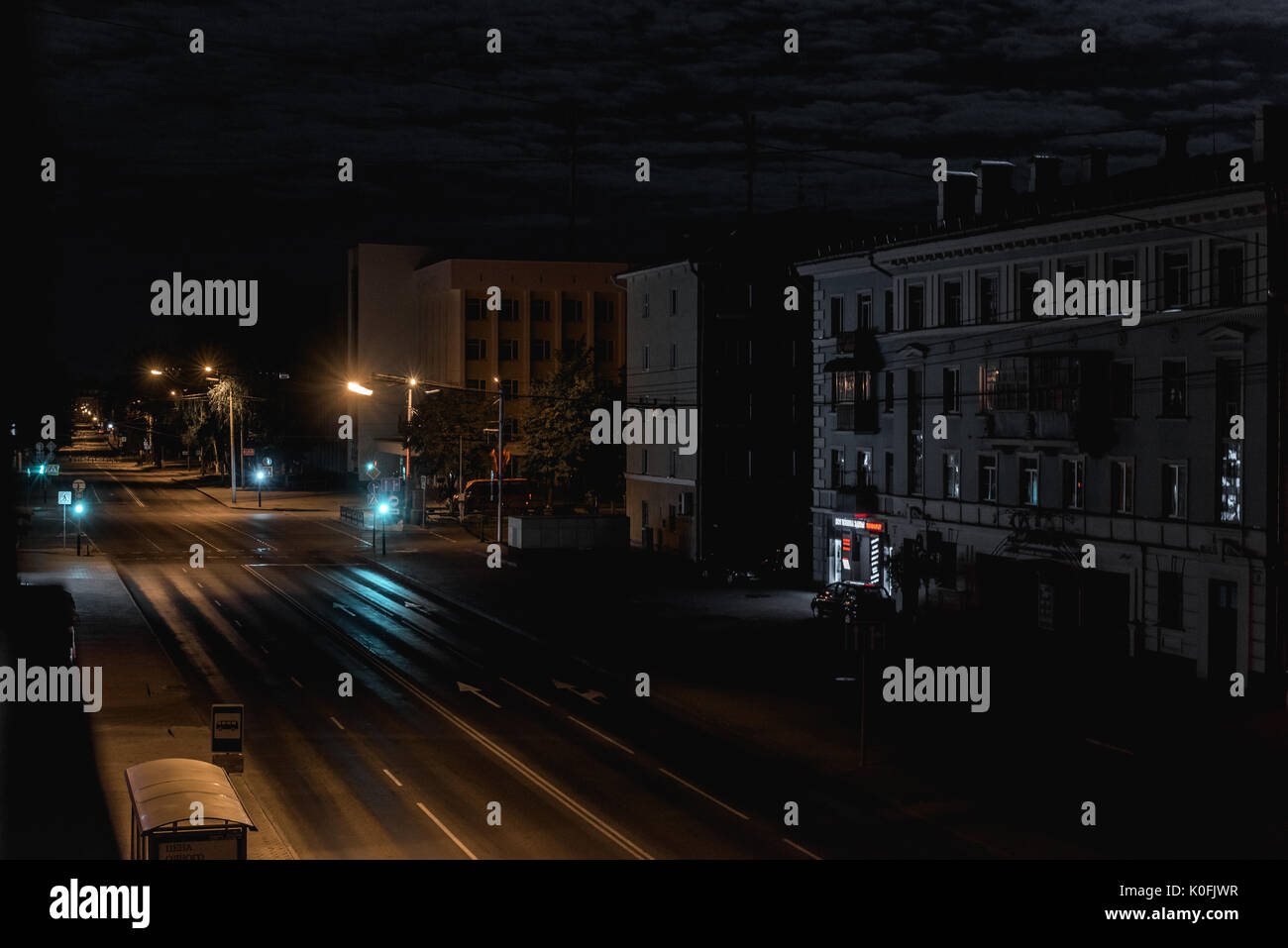 night city life: car and street lamps Stock Photo - Alamy