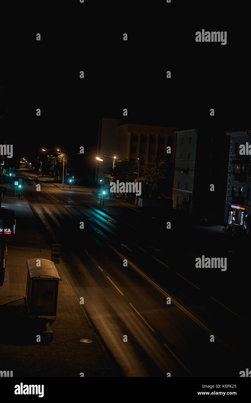 night city life: car and street lamps Stock Photo - Alamy