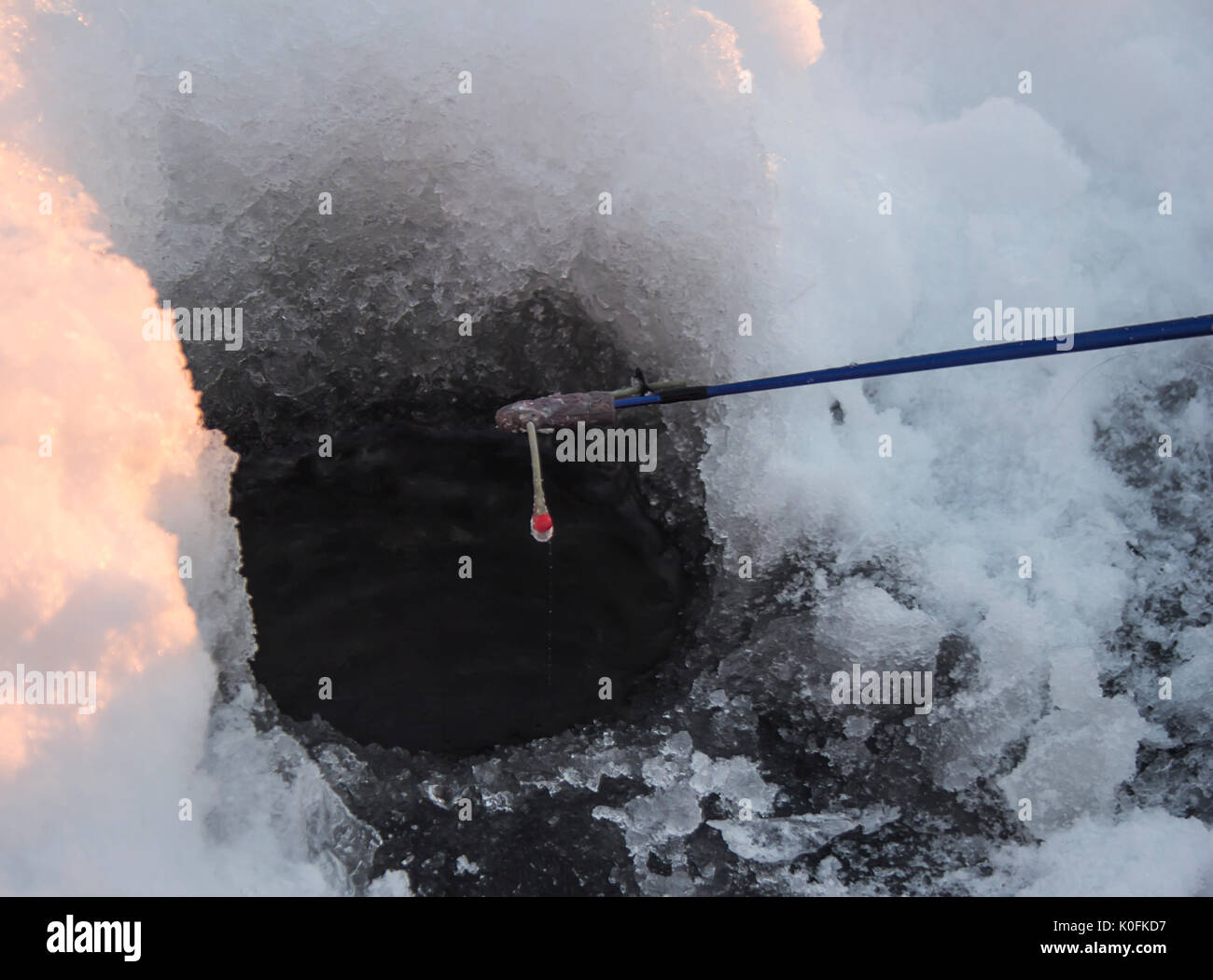 Ice hole hi-res stock photography and images - Alamy