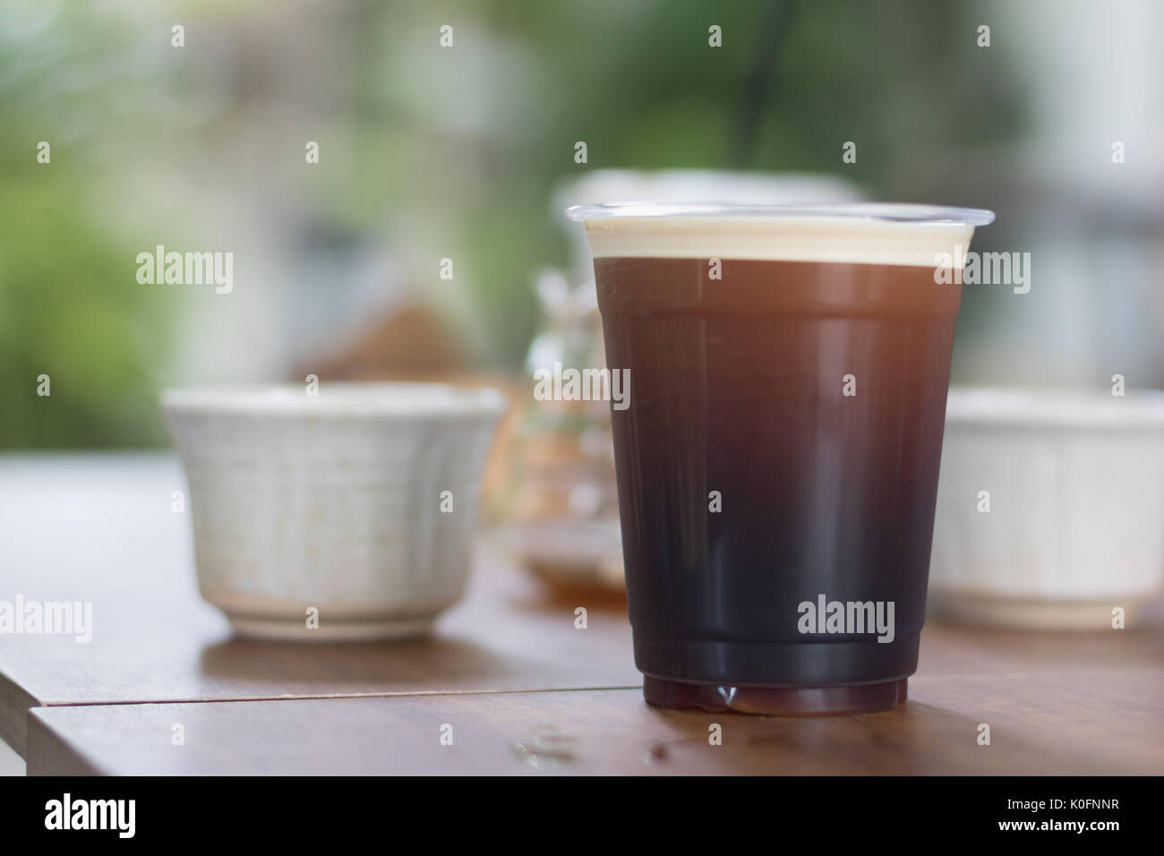 Sparkling Nitro Cold Brew Coffee in plastic take away cup ready to ...