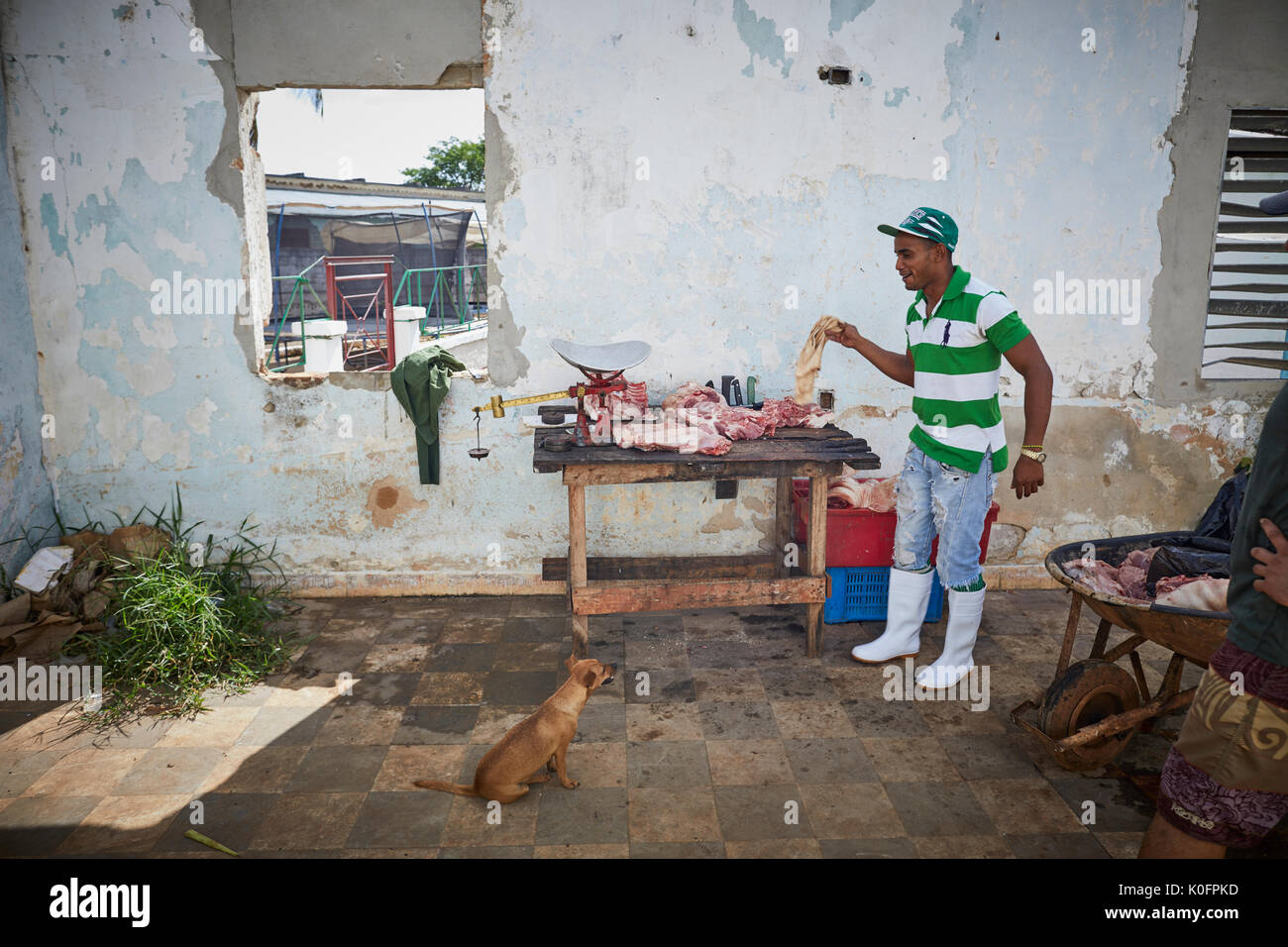 Cuban, Cuba, Cardenas, local butcher selling meat from a run down shop ...