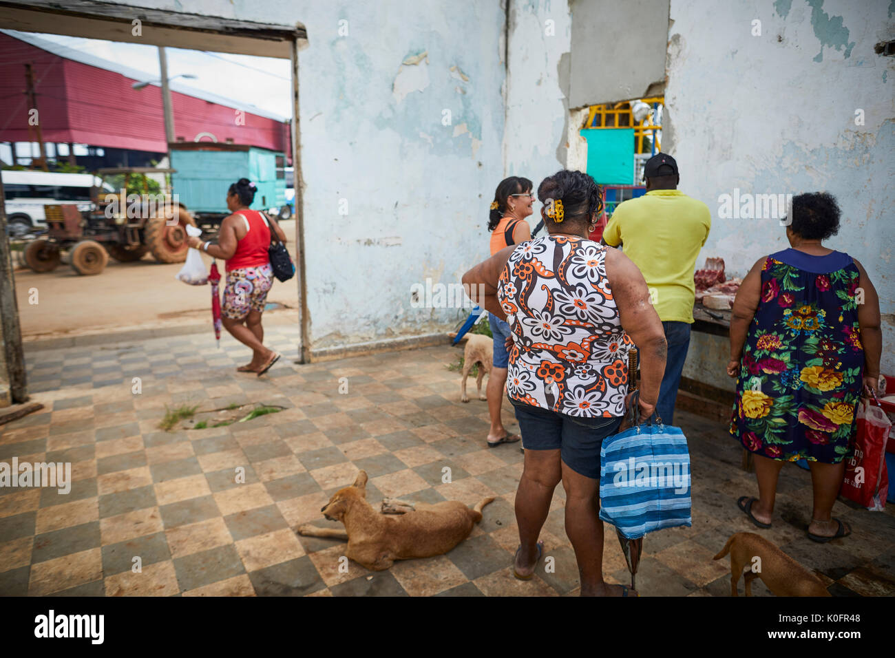 Cuban, Cuba, Cardenas, local butcher selling meat from a run down shop ...