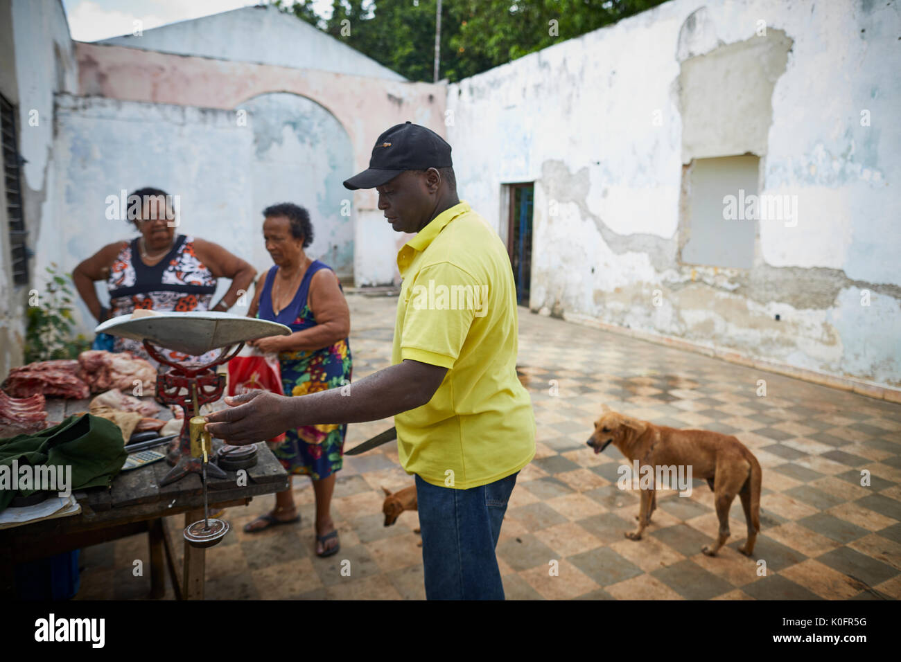 Cuban, Cuba, Cardenas, local butcher selling meat from a run down shop ...
