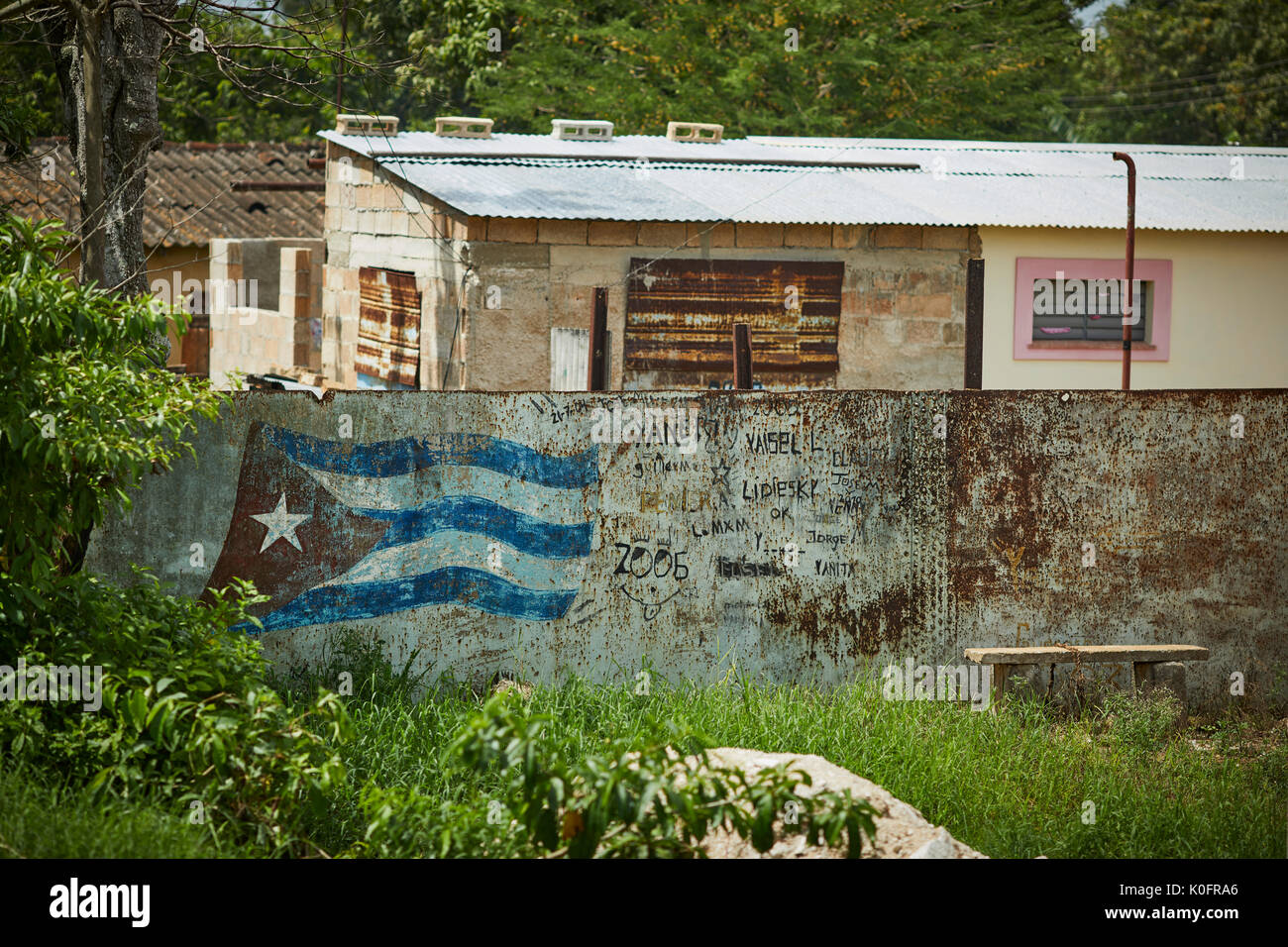 Cuban, Cuba, Cardenas, cuban flag faded mural painted on a village wall ...