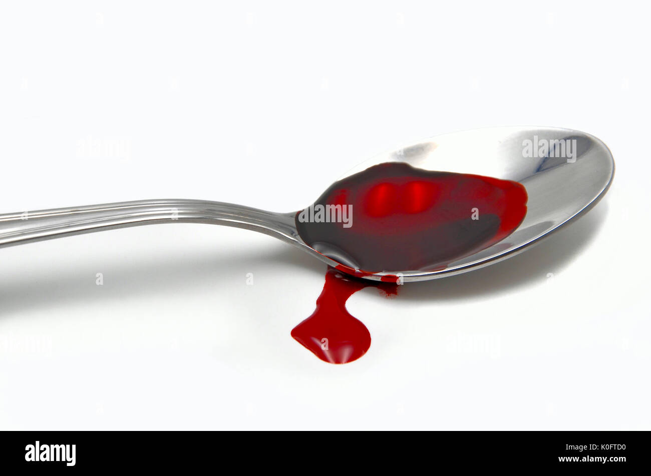 spoon with blood Stock Photo - Alamy