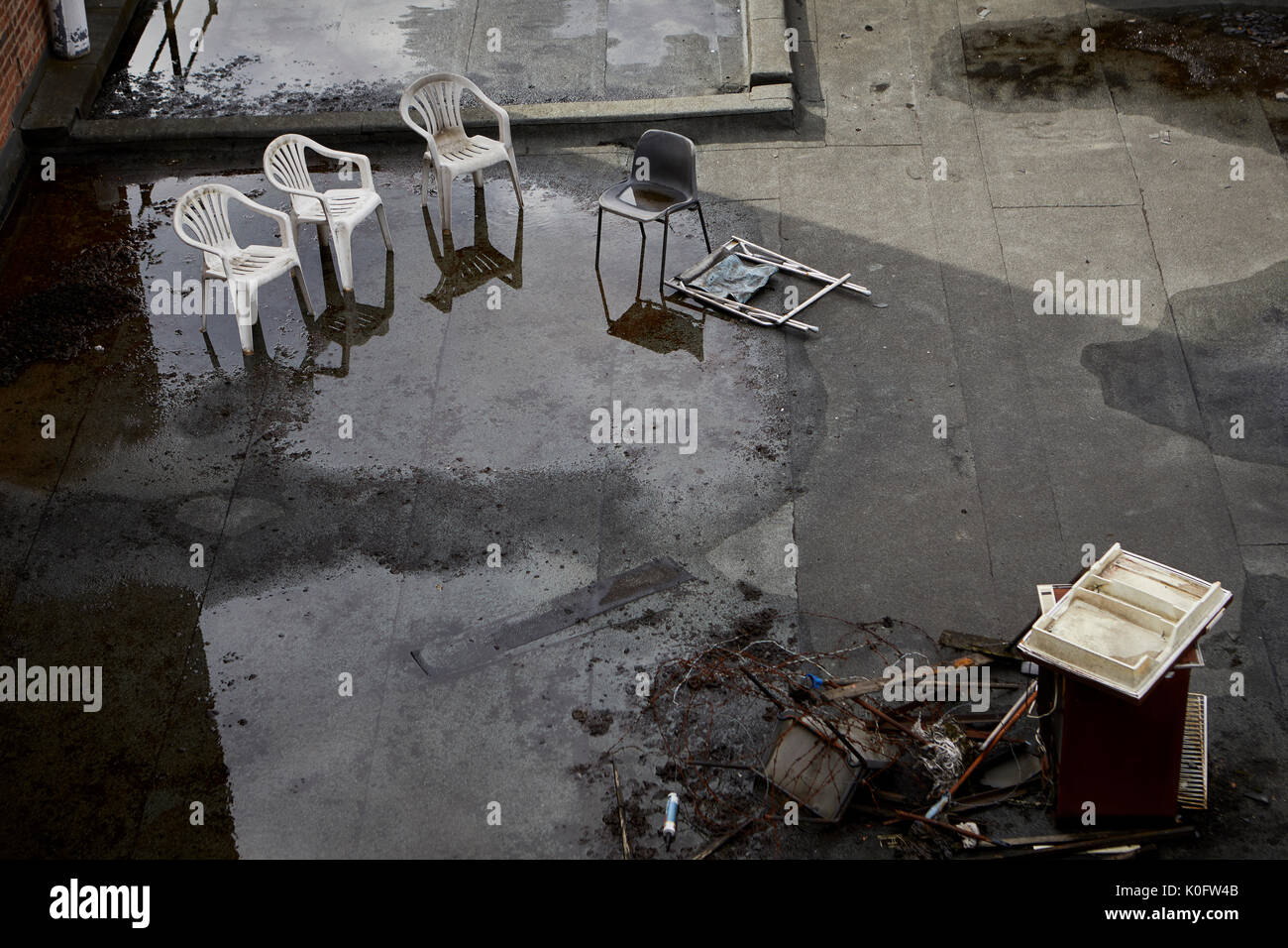 Manchester Northern Quarter plastic chair on a makeshift rooftop ...