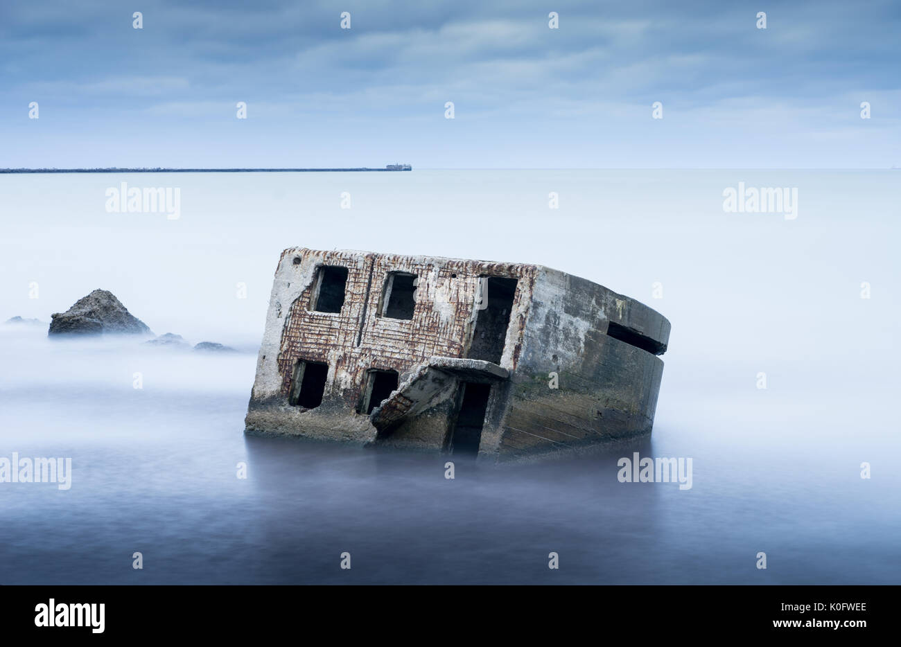 Liepaja beach bunker. Brick house, soft water, waves and rocks ... Liepaja beach bunker. Brick house, soft water, waves and rocks ...