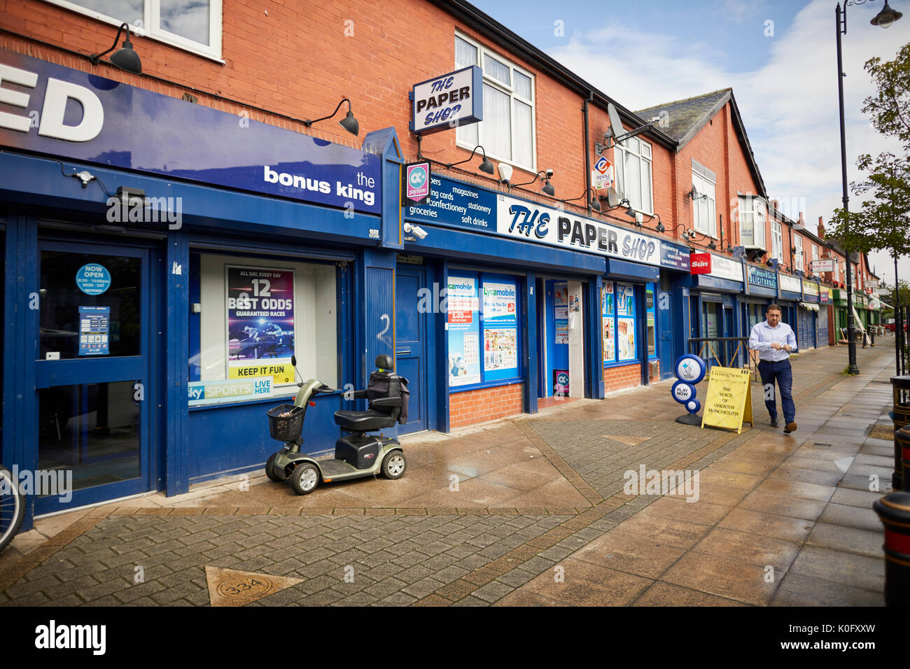 Platt Lane, a shopping parade of local shops in the Manchester suburb ...