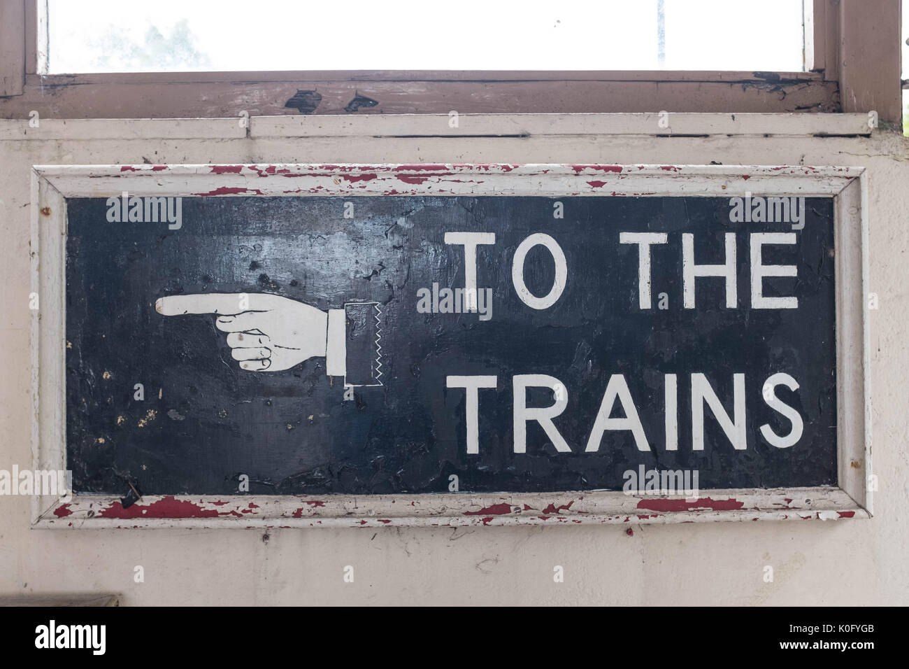 To the Trains sign at railway station Stock Photo - Alamy