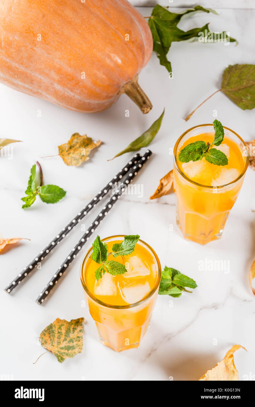 Fall And Winter Cold Cocktails Spicy Pumpkin Mojito With Fresh Mint On White Marble Table