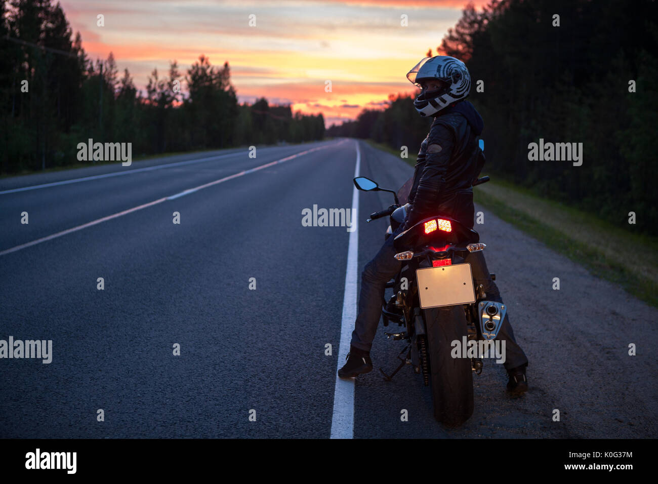 Road turning bike hi-res stock photography and images - Alamy