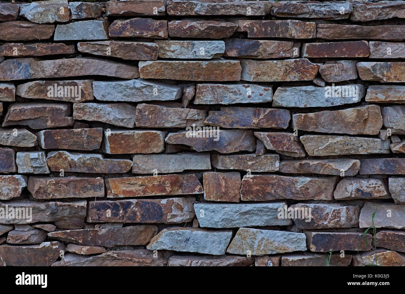 Beautiful texture of natural stones stacked in tiers. The color of the ...