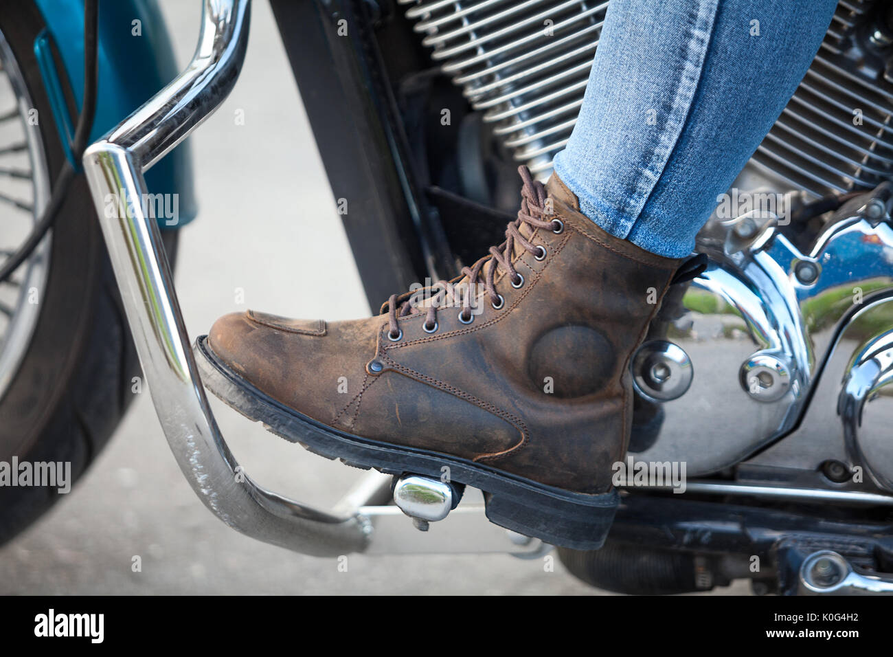 Close up, side view at female foot with protective brown boot on the ...