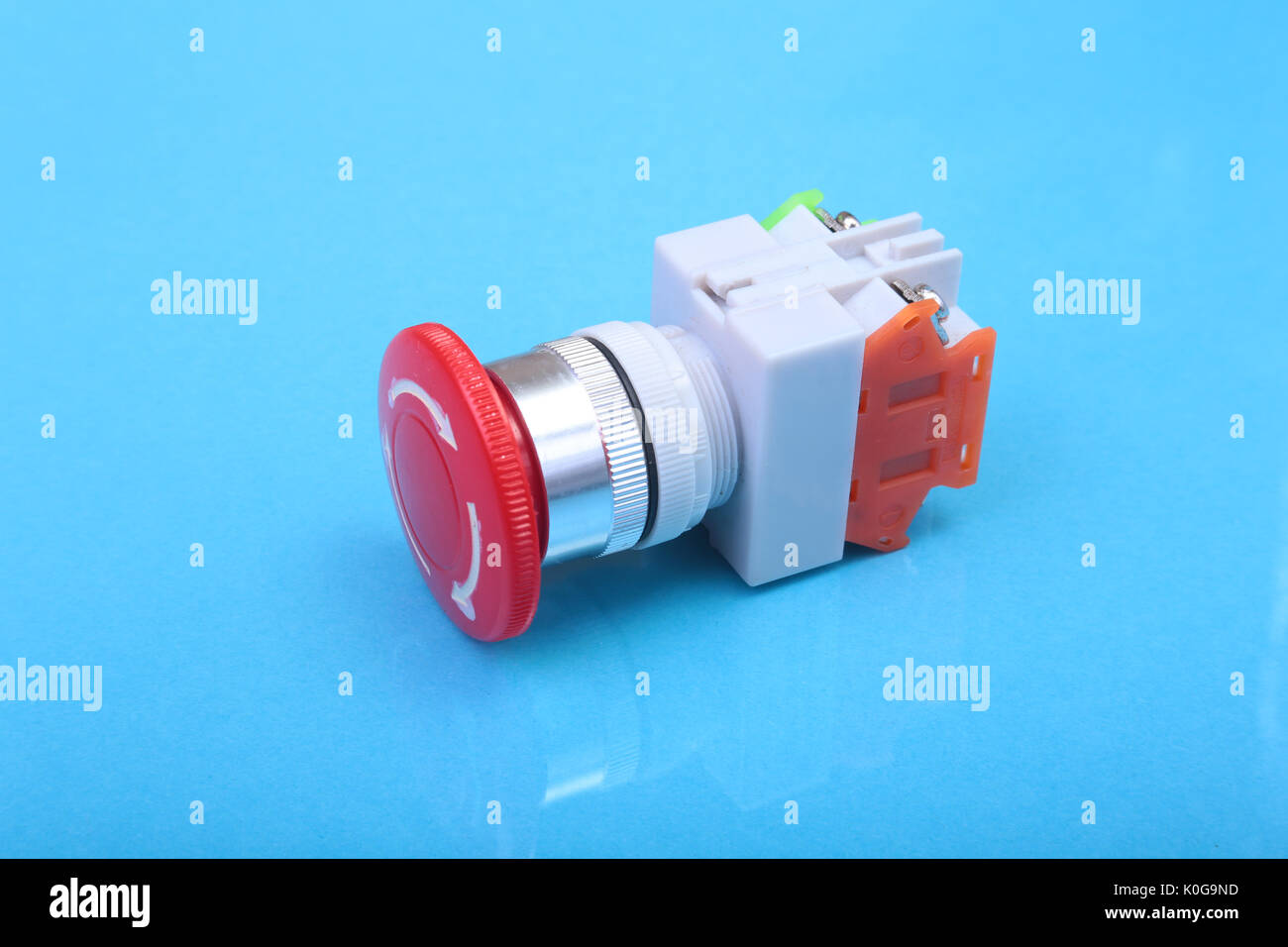 Close-up emergency stop button isolated on blue mirror background Stock ... Close-up emergency stop button isolated on blue mirror background Stock ...
