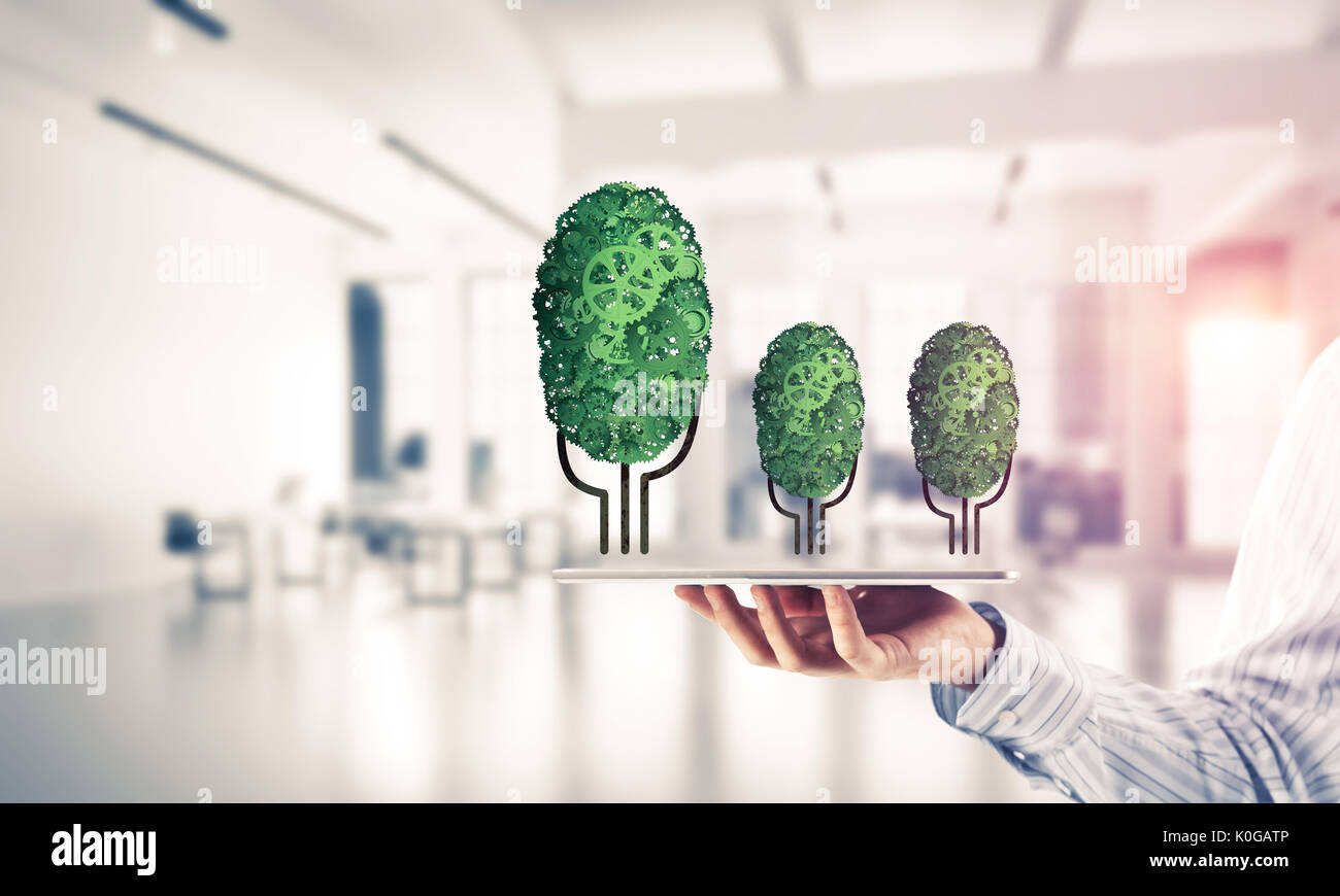 Eco green environment concept presented by tree as working mecha Stock ...