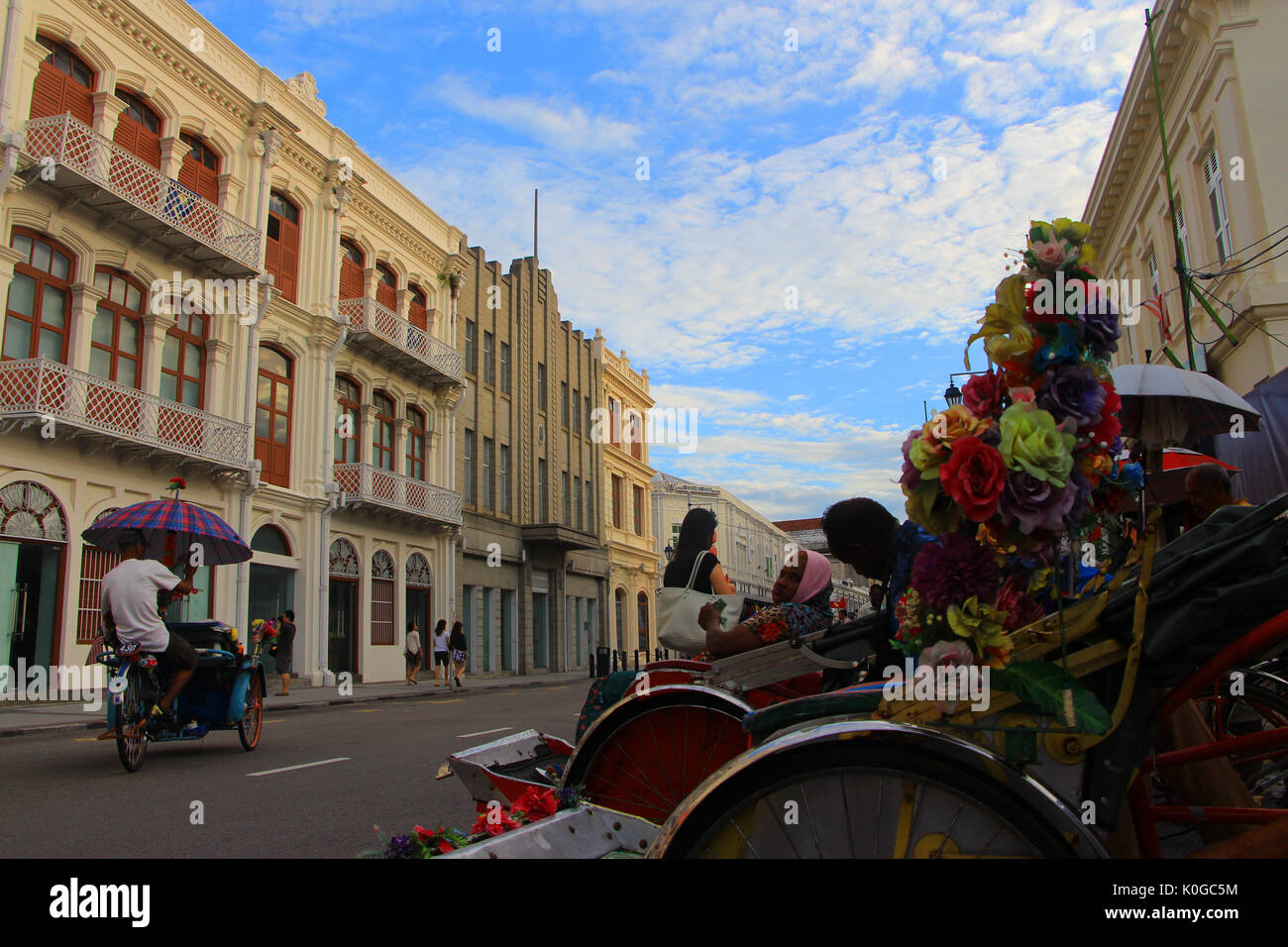 Trishaw riders in Penang, Malaysia Stock Photo - Alamy