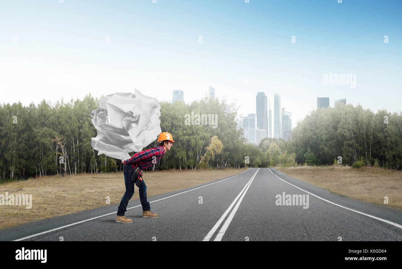 Engineer man carry load Stock Photo - Alamy