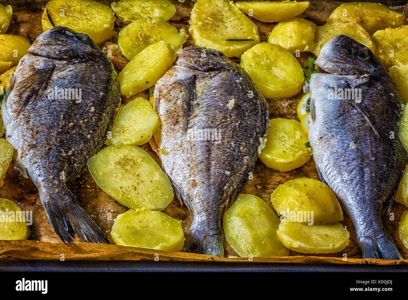Raw dorado fish ready hi-res stock photography and images - Alamy