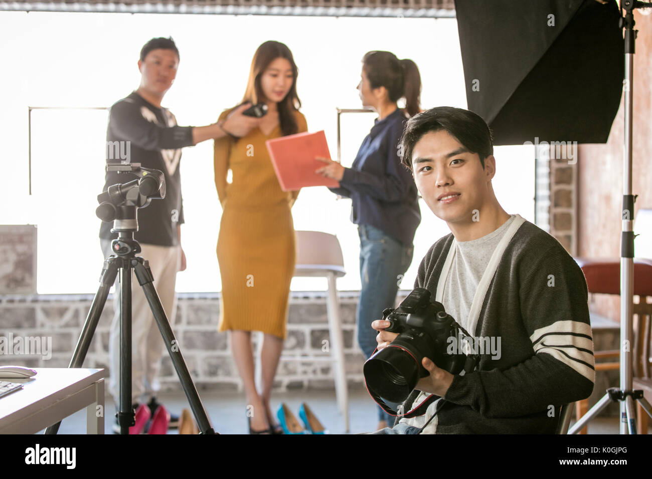 Smiling photographer hi-res stock photography and images - Alamy