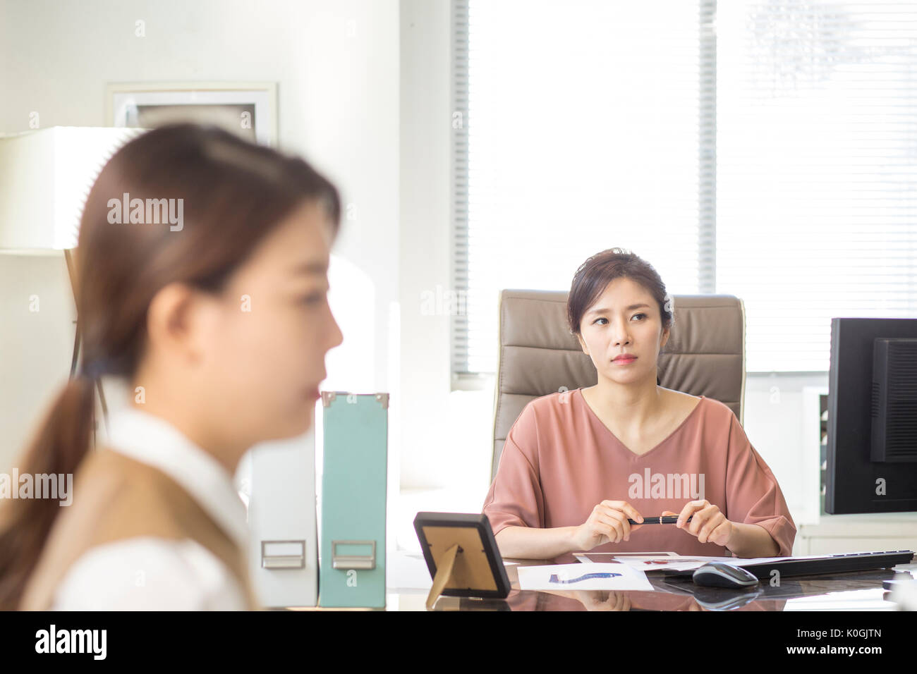 Female office staff hi-res stock photography and images - Alamy